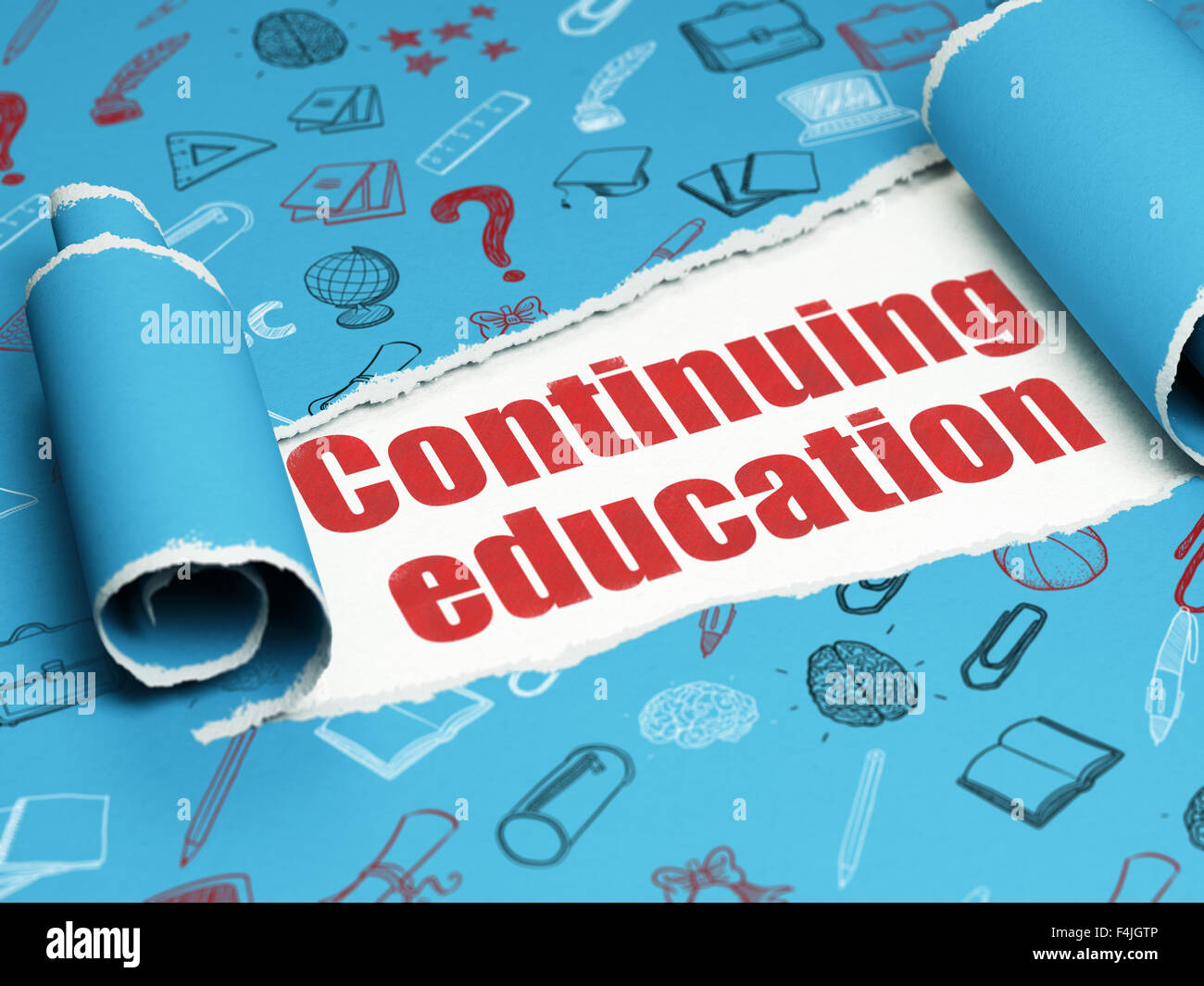 Studying concept: red text Continuing Education under the piece of torn ...