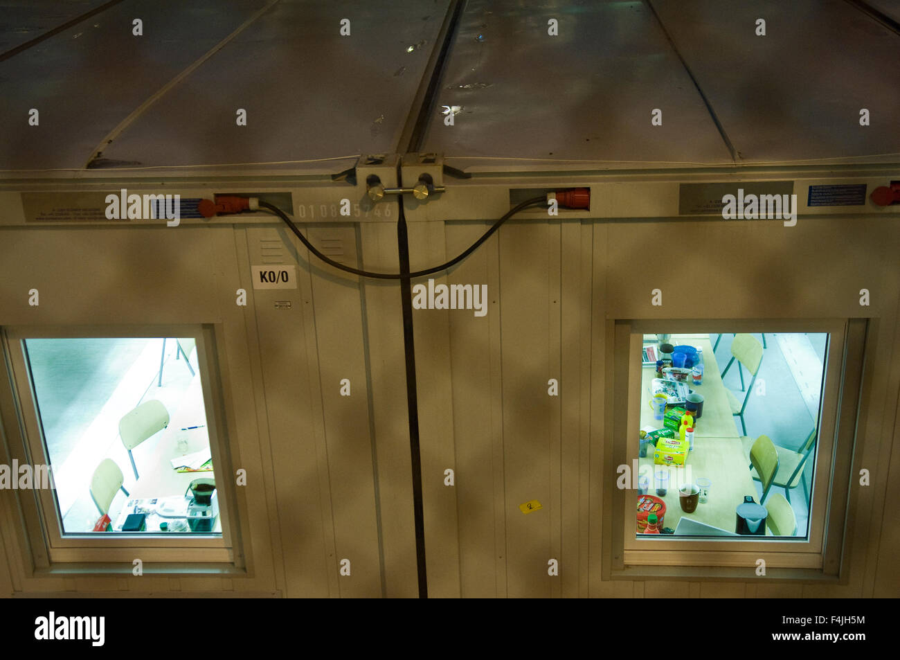 Sweden, Stockholm, illuminated interior of cubicle at construction site ...