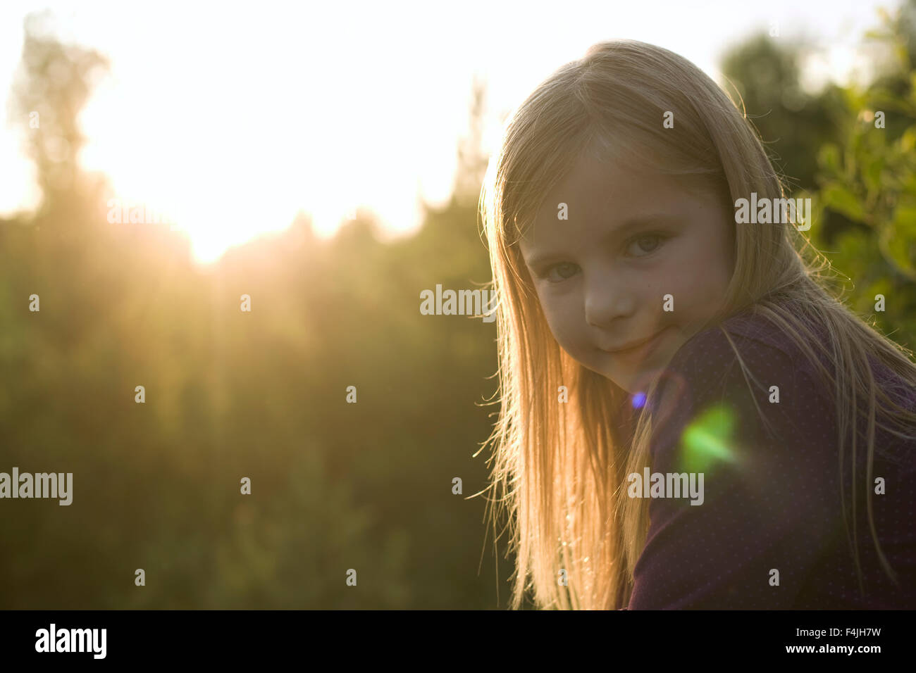 Portrait of girl in sunlight Stock Photo - Alamy