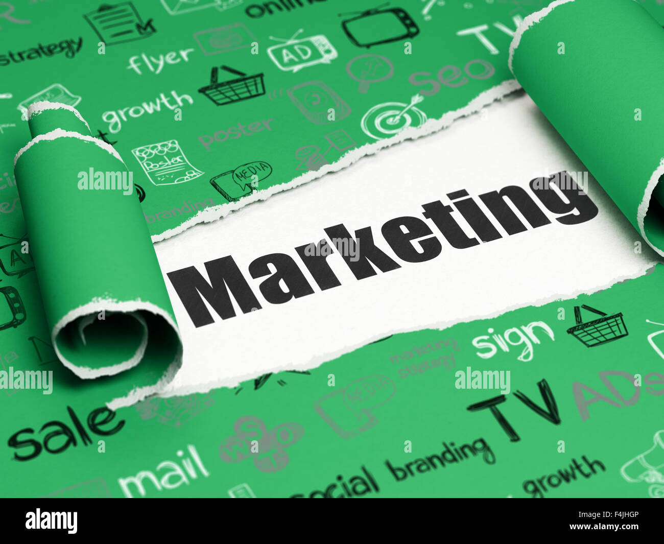 Advertising concept: black text Marketing under the piece of torn paper ...