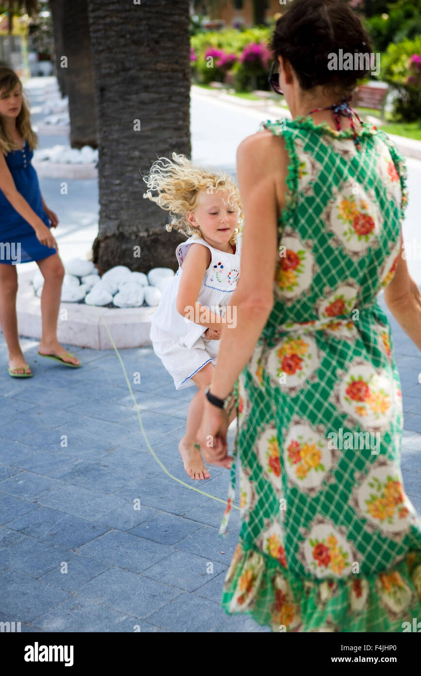 Mother daughter jumping rope hi-res stock photography and images - Alamy