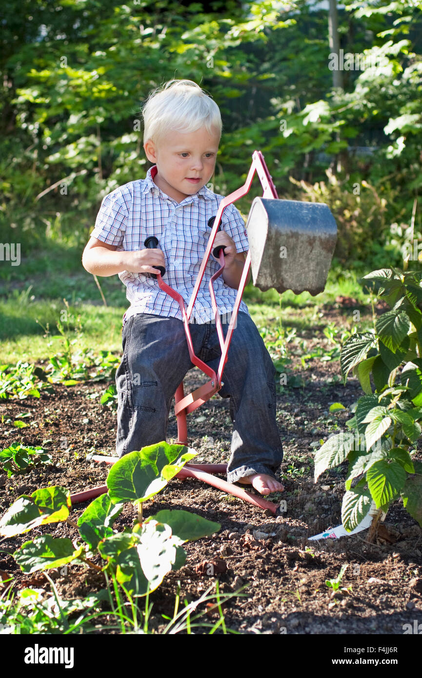 Boy playing digger hi-res stock photography and images - Alamy