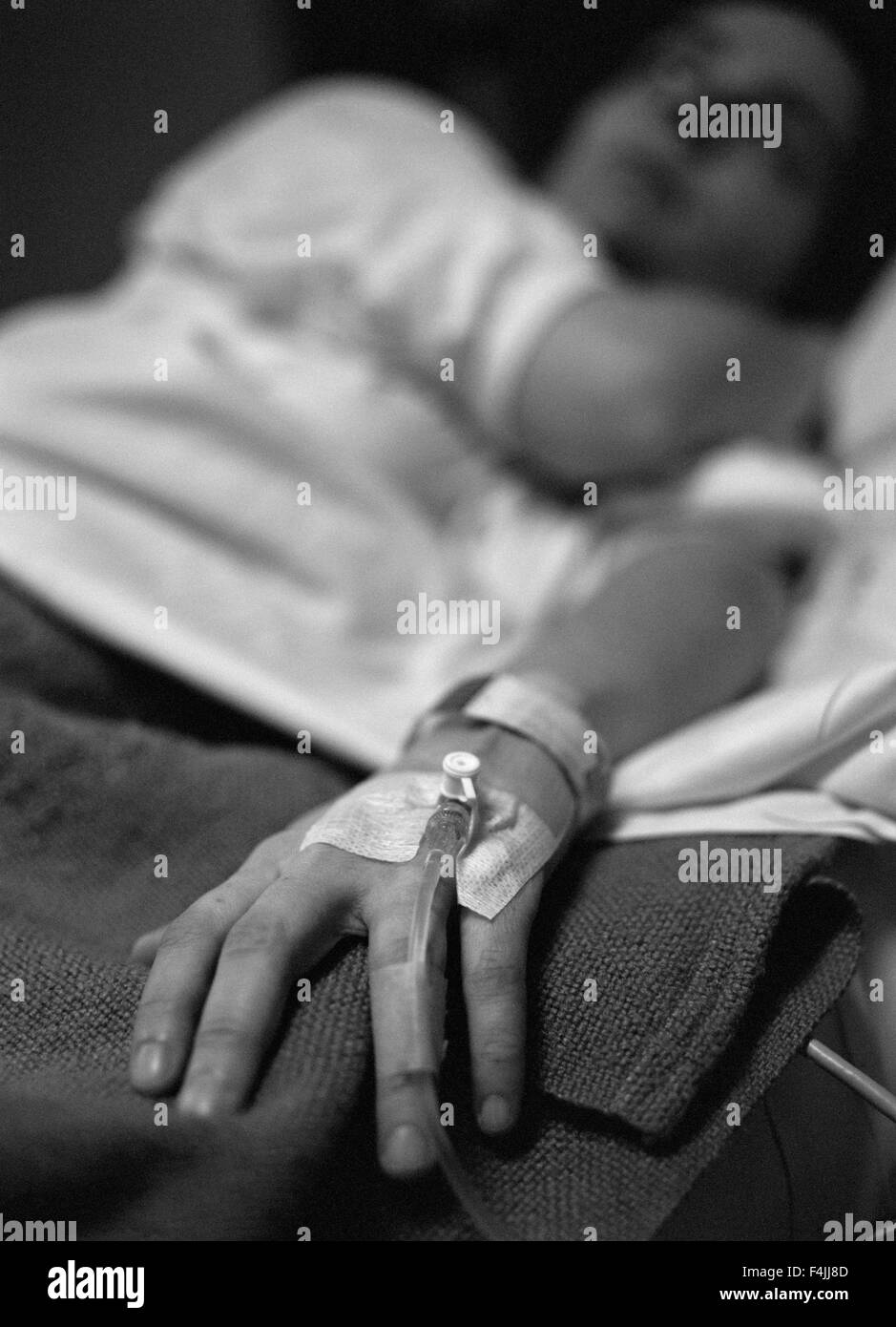 Iv drip and hand Black and White Stock Photos & Images - Alamy