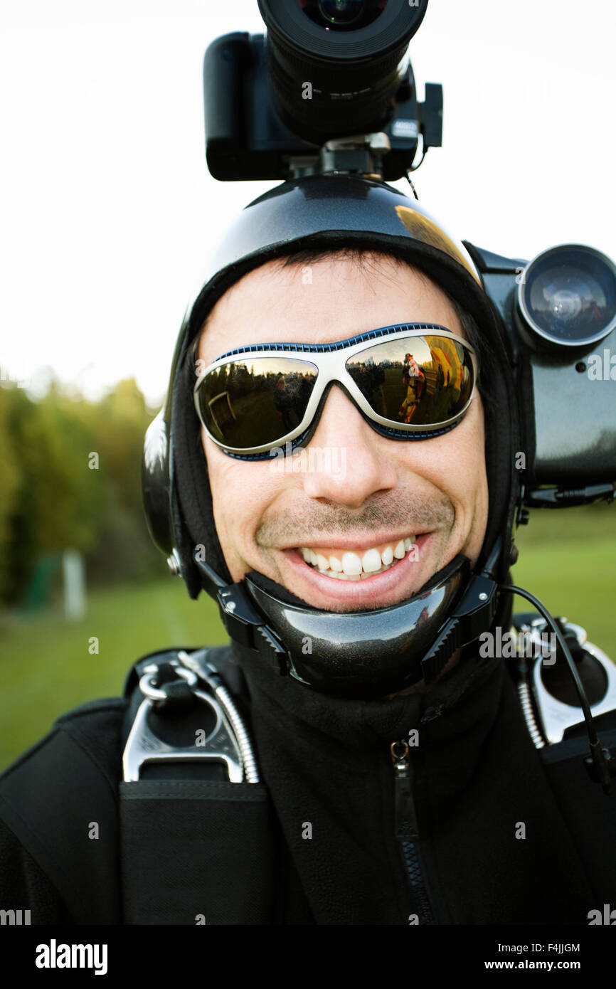 Portrait of parachuter wearing suit with cameras Stock Photo - Alamy