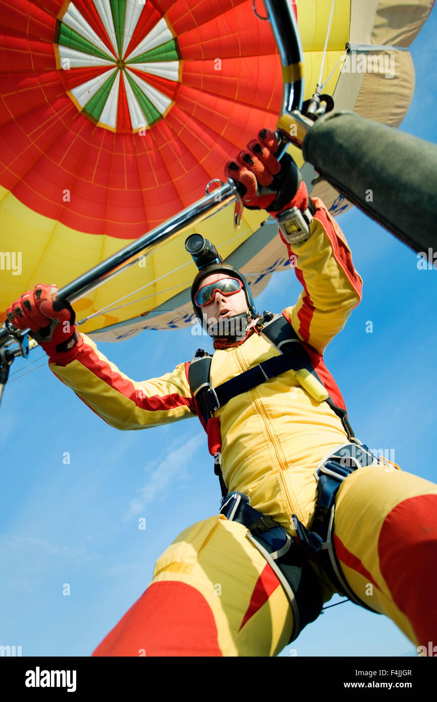 Man in hot air balloon Stock Photo - Alamy