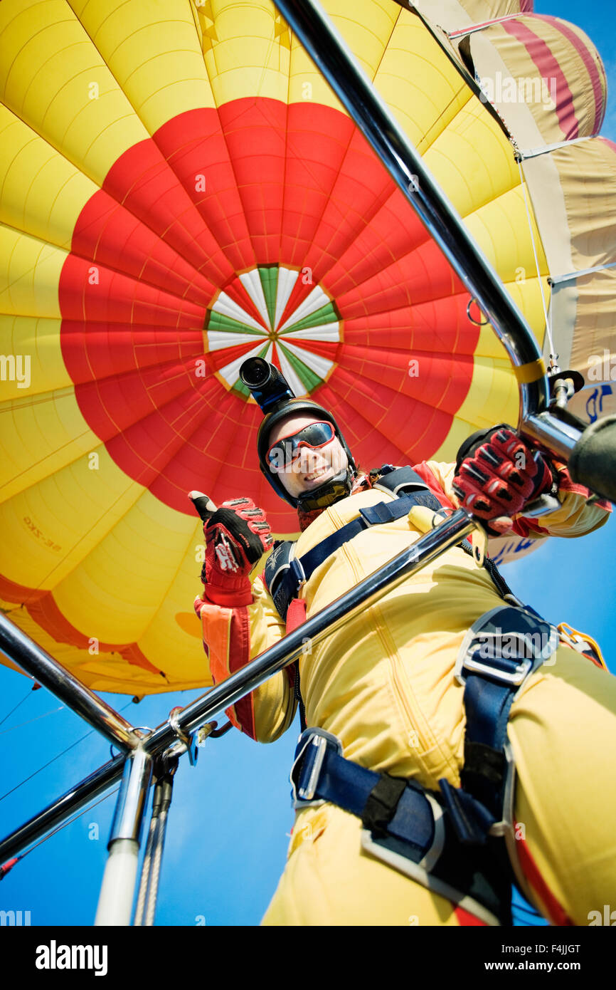 Portrait of man in hot air balloon Stock Photo - Alamy