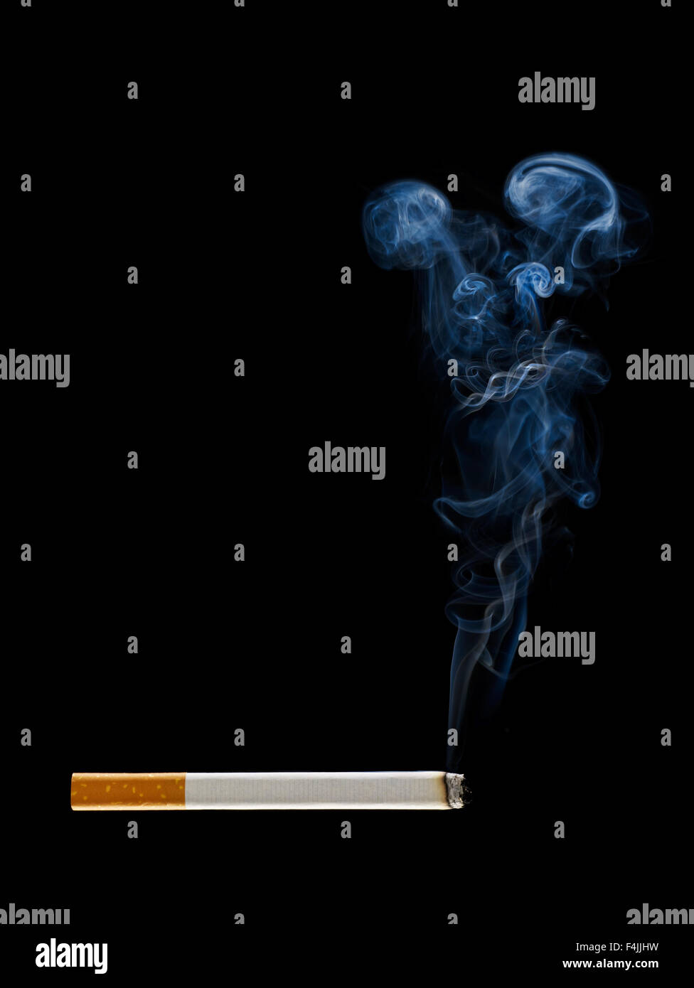 Cigarette with smoke Stock Photo - Alamy