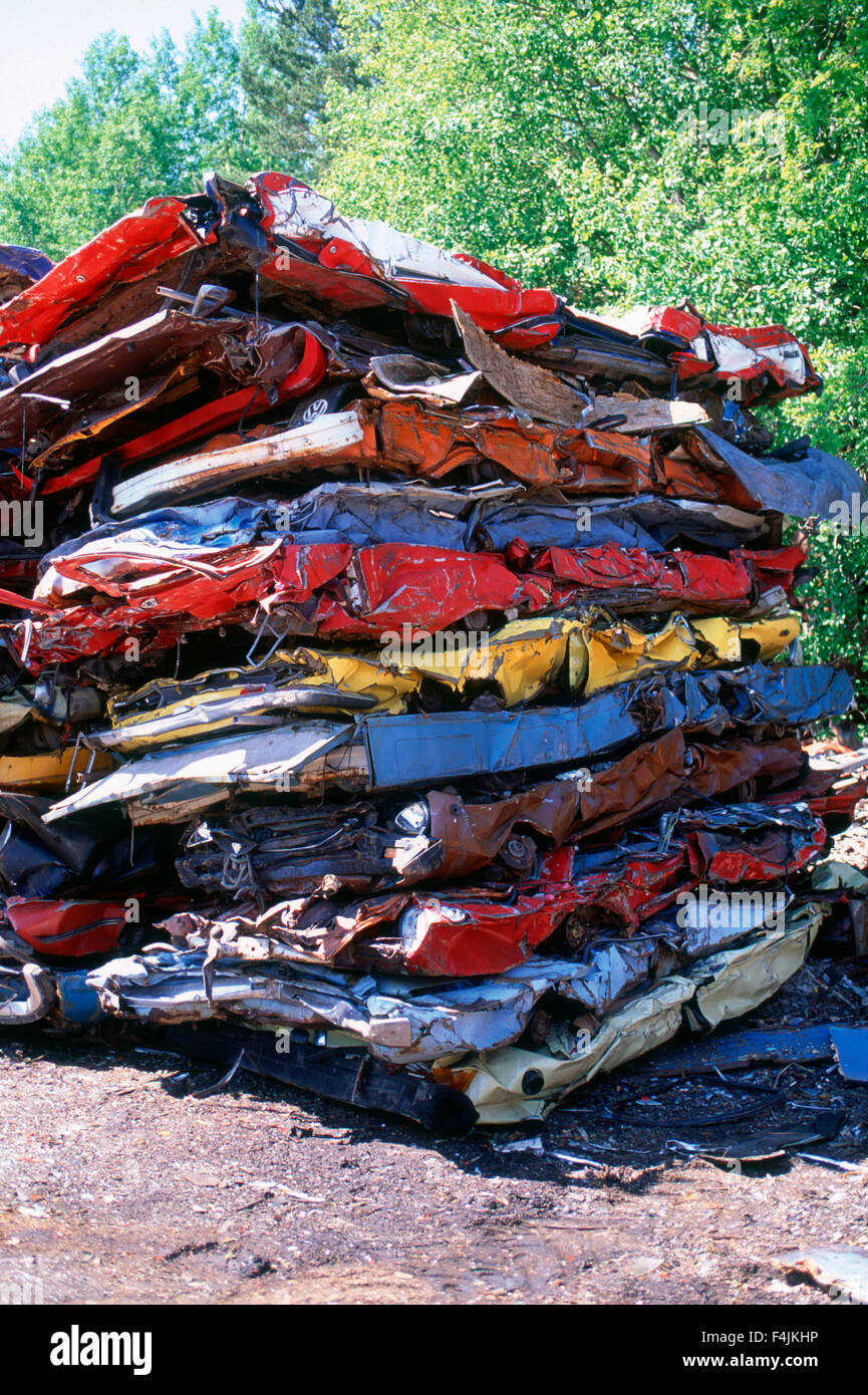 Wrecked cars stacked at scrap yard Stock Photo - Alamy