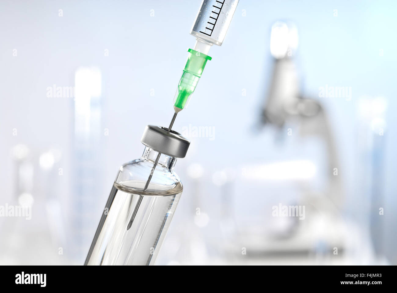 Laboratory scene with syringe, medicine and microscope Stock Photo - Alamy