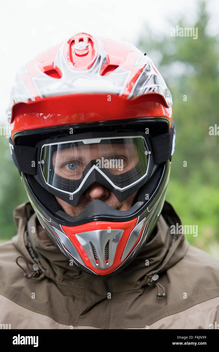 Man wearing crash helmet hi-res stock photography and images - Alamy