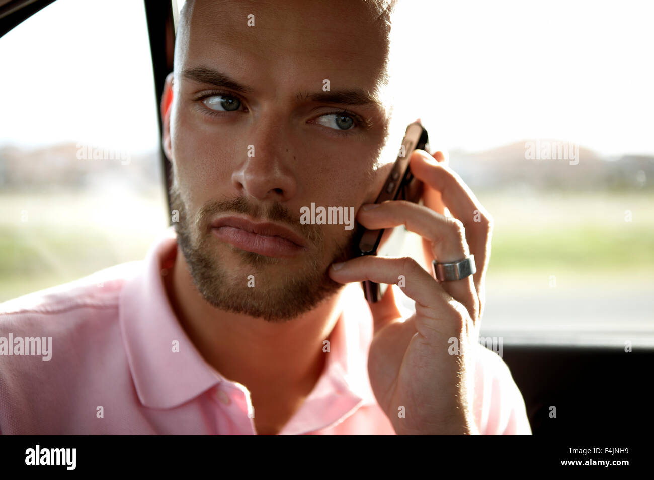 South Africa, Western Cape Province, Cape Town, young man using cell ...