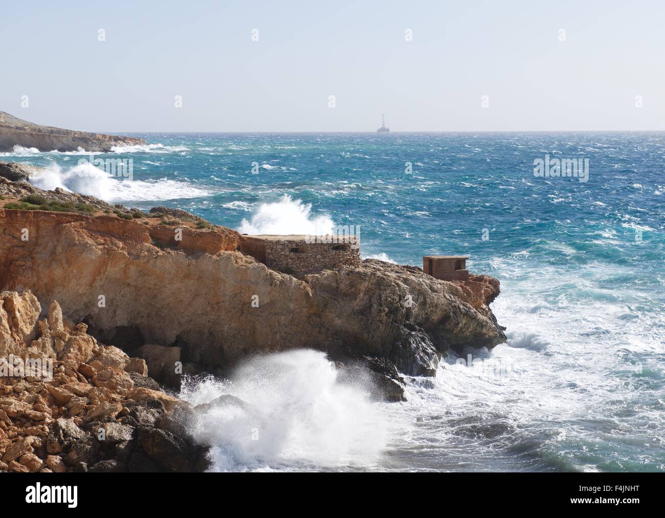 Maltese coastline with the cliffs,gold rocks over the sea in the Malta ...