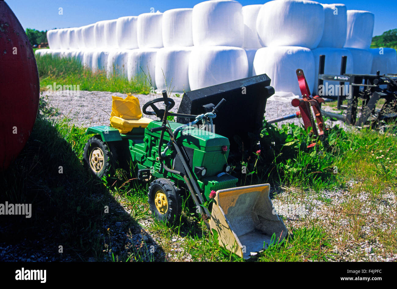 Tractor in small factory Stock Photo - Alamy