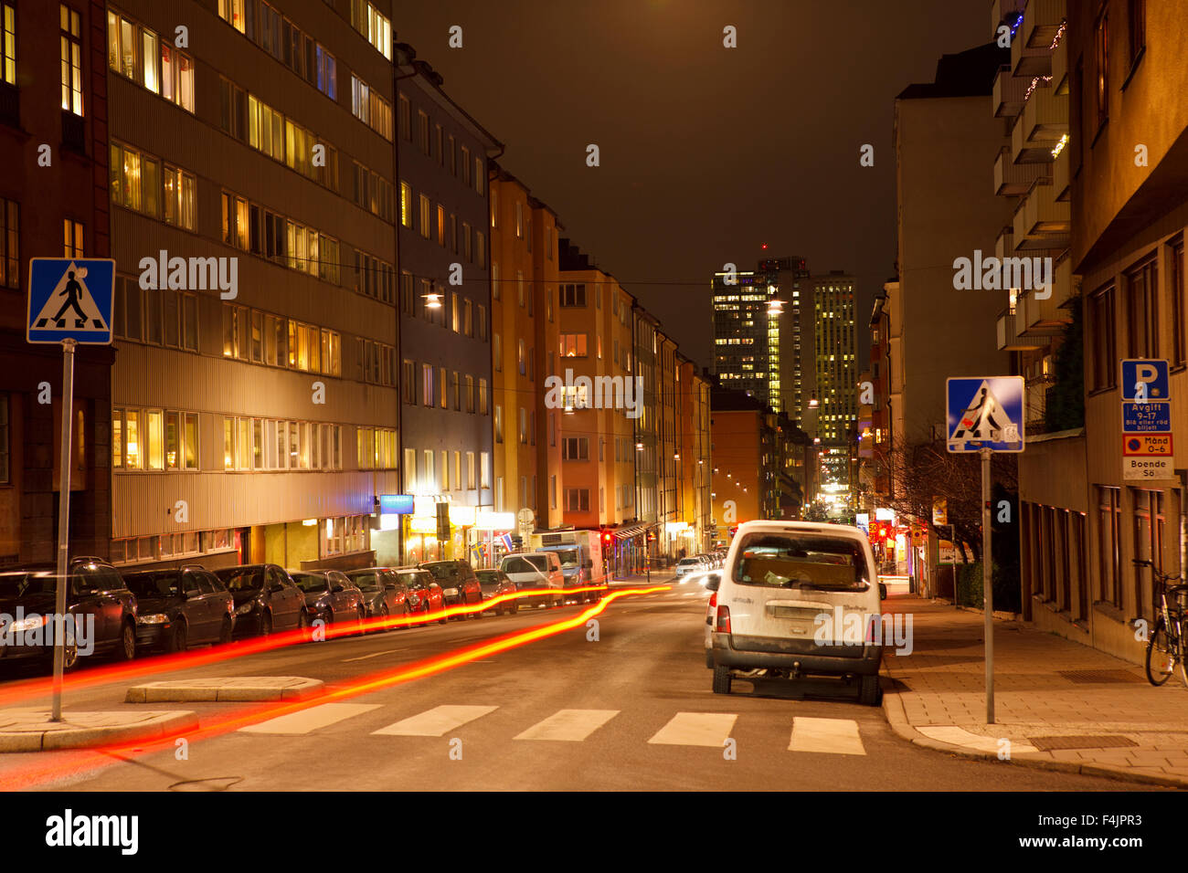 View of city street at dusk Stock Photo - Alamy