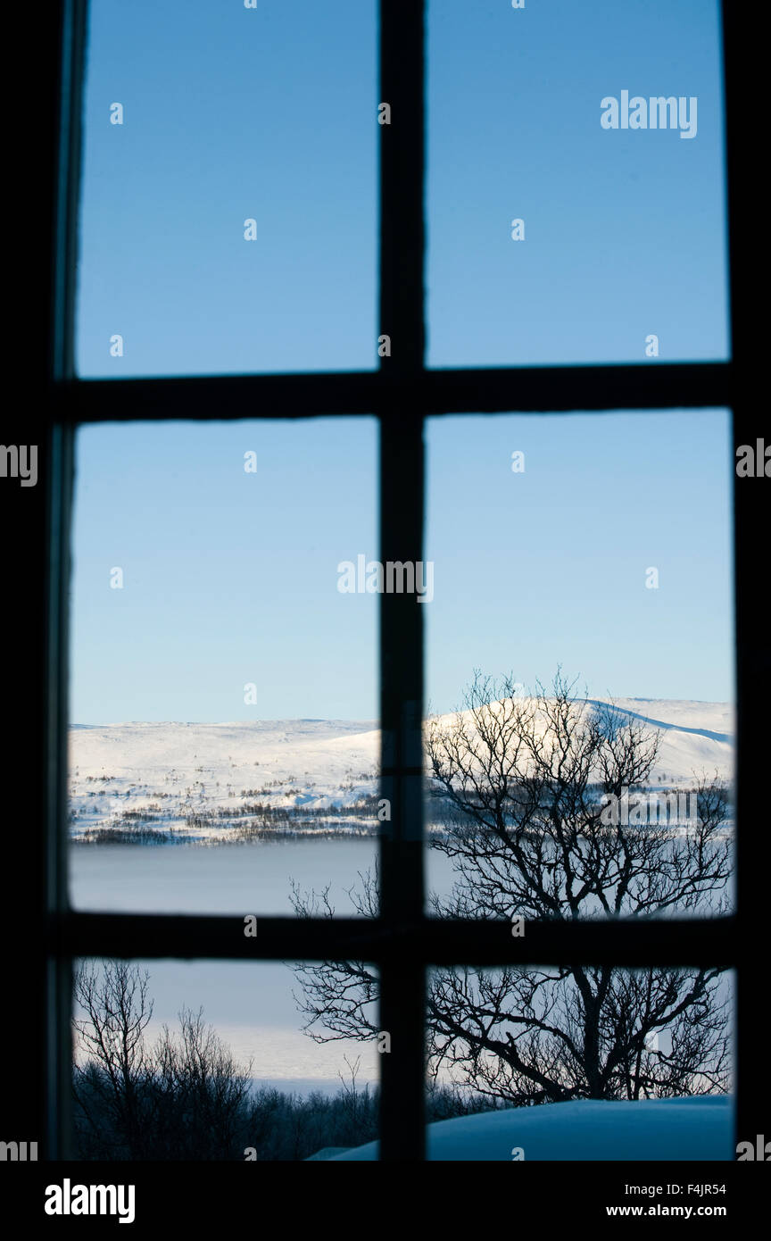 View of winter landscape through window Stock Photo - Alamy