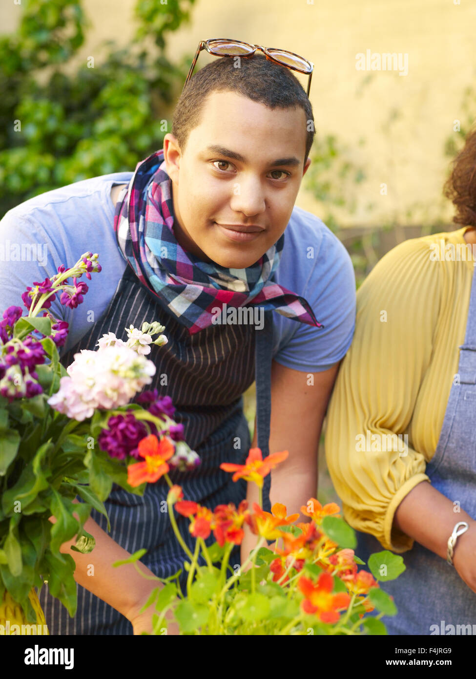 Young man looking at camera Stock Photo - Alamy