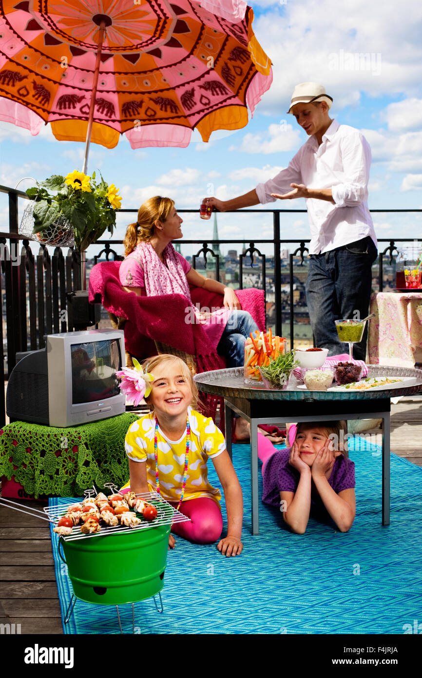 Party on balcony hi-res stock photography and images - Alamy