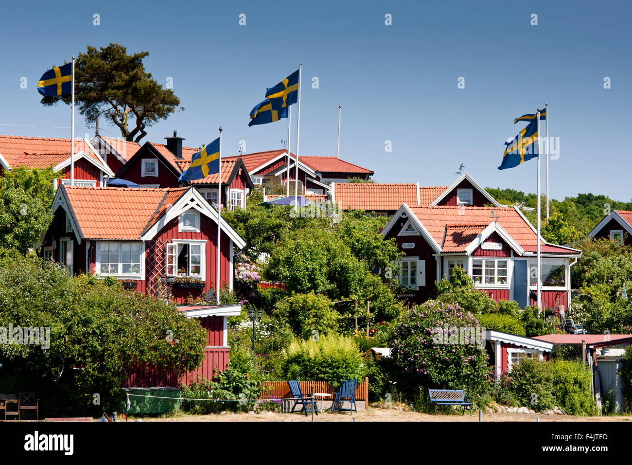 Small red summer cottages Stock Photo - Alamy