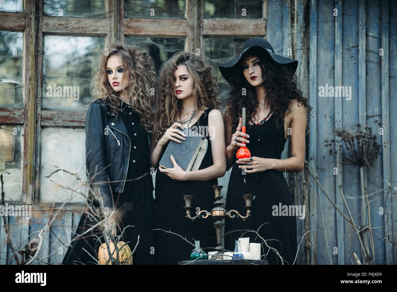 three vintage women as witches Stock Photo - Alamy