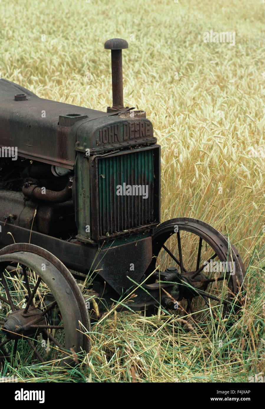 Old Fashioned Tractor In Farm Field Stock Photos & Old Fashioned ...