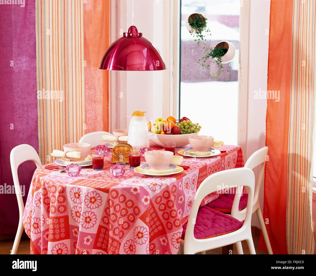 Pink dining area Stock Photo - Alamy