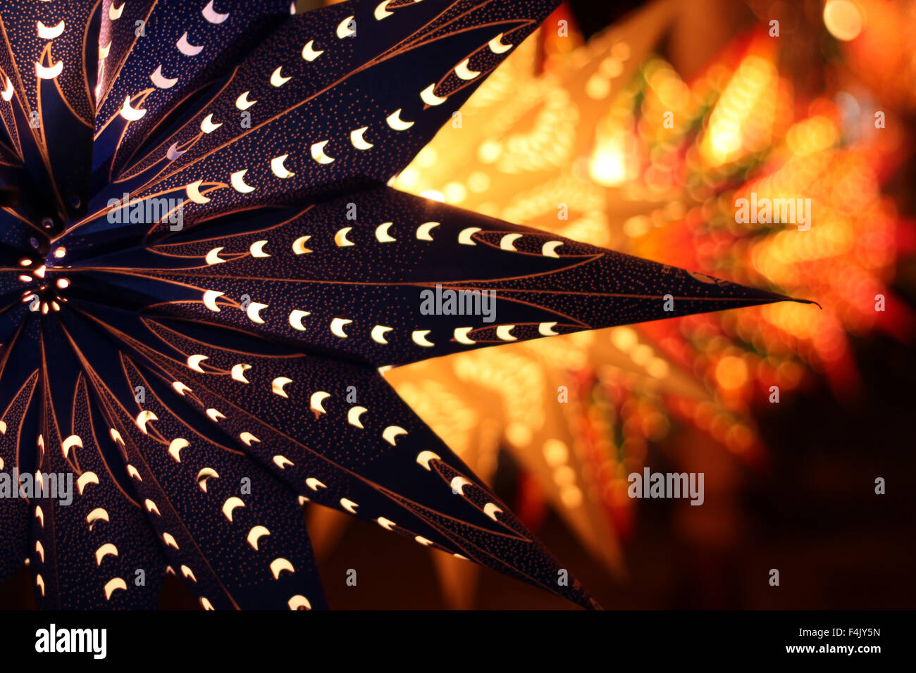 A traditional lantern on the backdrop of other lanterns lit on the ...