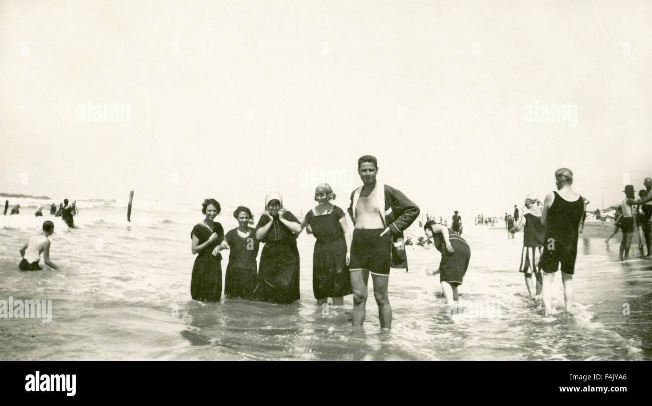 Group with long bathing suits hi-res stock photography and images - Alamy