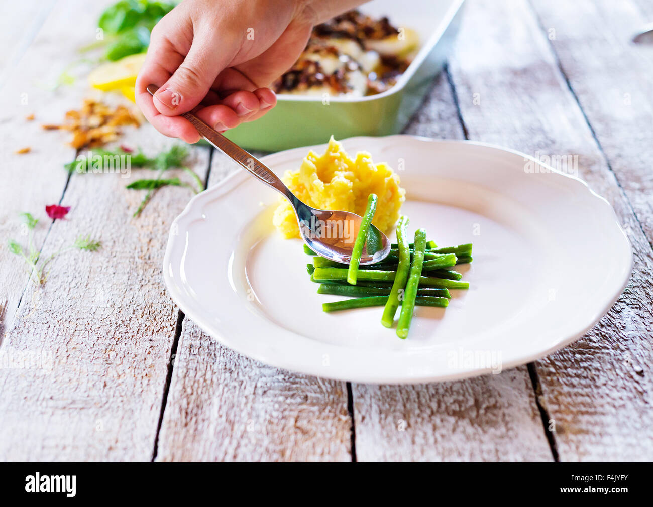 Man serving fish Stock Photo - Alamy