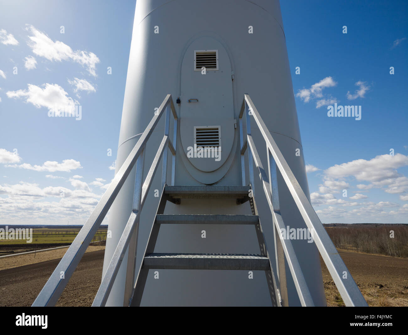 Steps and door of wind turbine Stock Photo - Alamy
