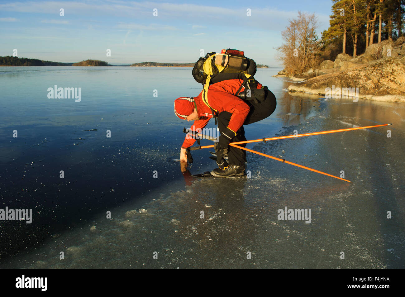 Man standing on ice Stock Photo - Alamy