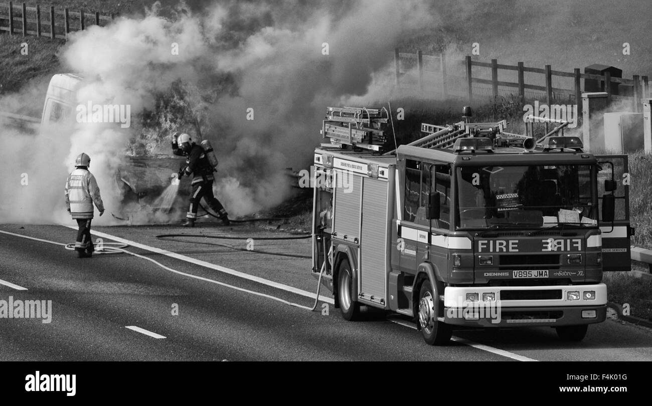 Putting out the fire Black and White Stock Photos & Images - Alamy