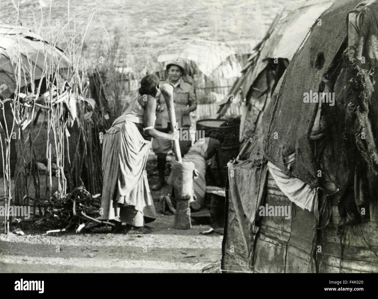 Italian colonial soldier with a black woman who works, Ethiopia Stock ...