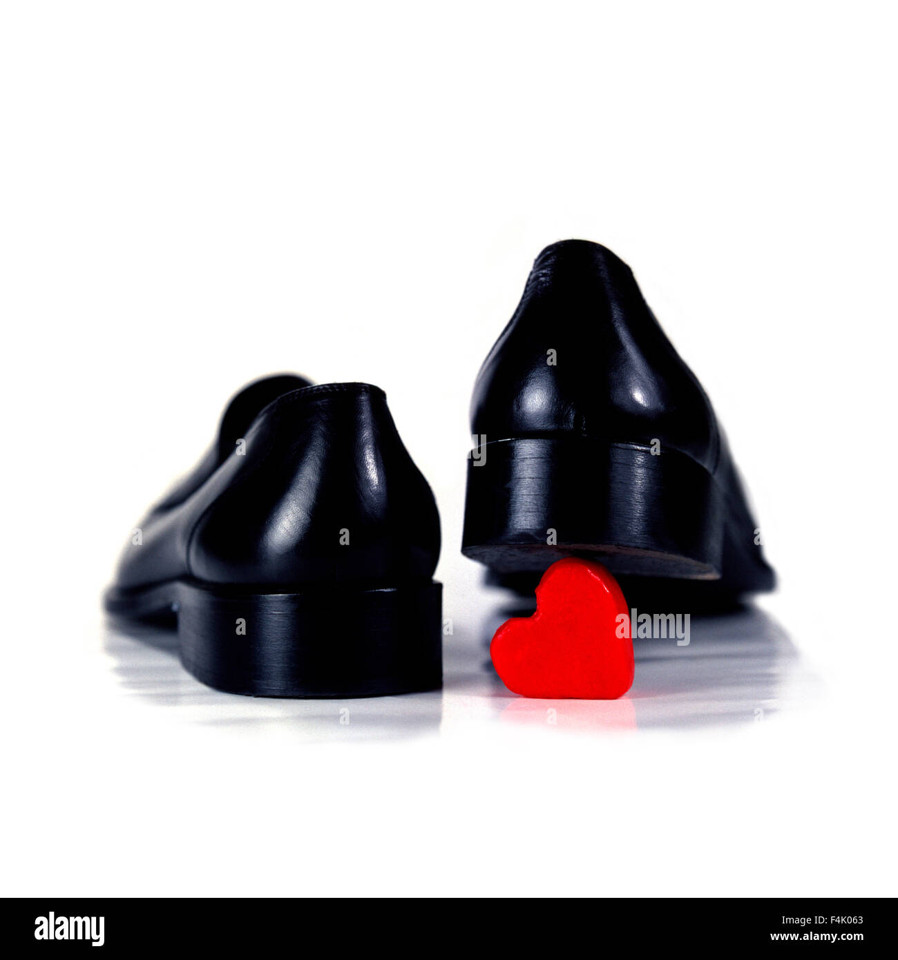 Shoe Crushing Heart Shape Stock Photo - Alamy