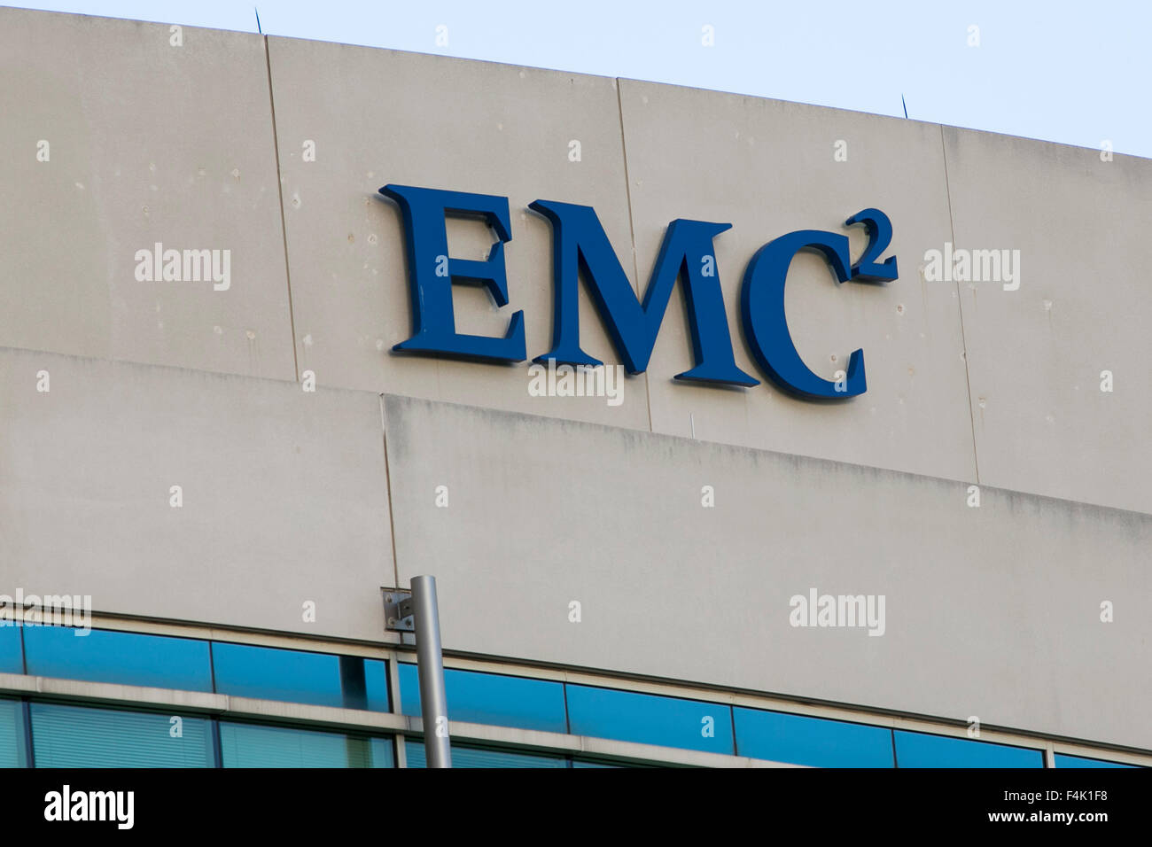 A logo sign outside of an office building occupied by EMC Corporation ...