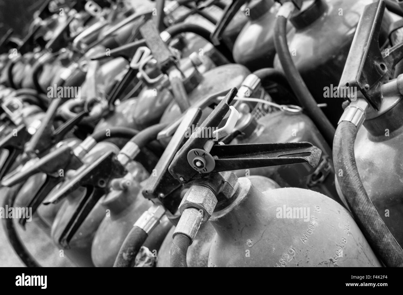Emergency fire extinguishers Black and White Stock Photos & Images - Alamy