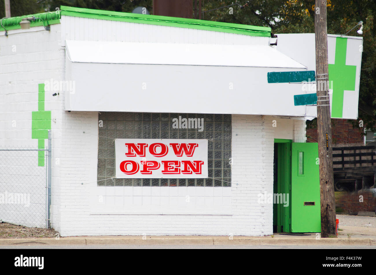 Marijuana Dispensary, A Place To Buy With A Big Green Cross Stock Photo ...