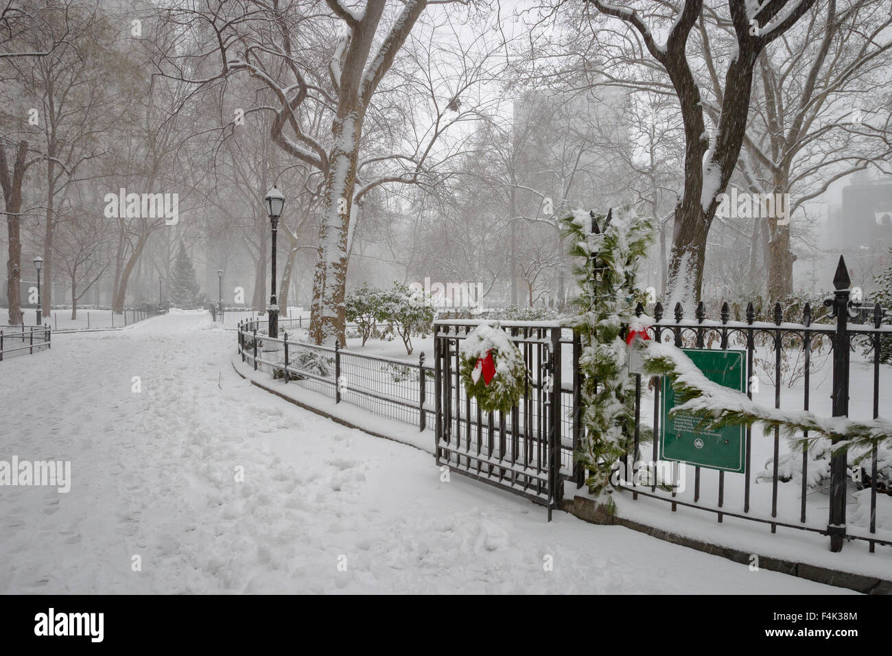 Madison Square Park covered with snow. Wintertime in the Flatiron ...