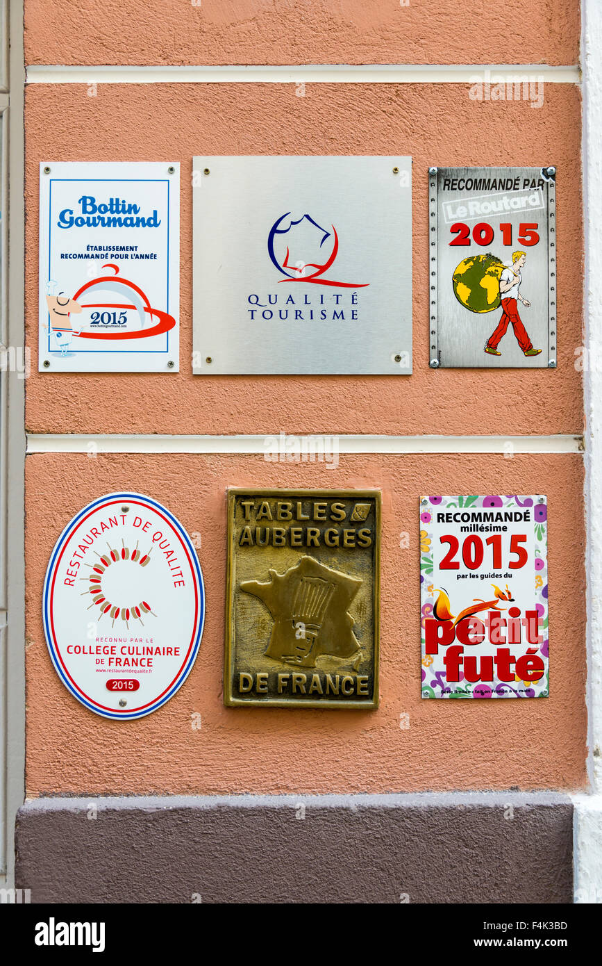 French Hotel quality organisation signs on a wall outside a hotel in ...