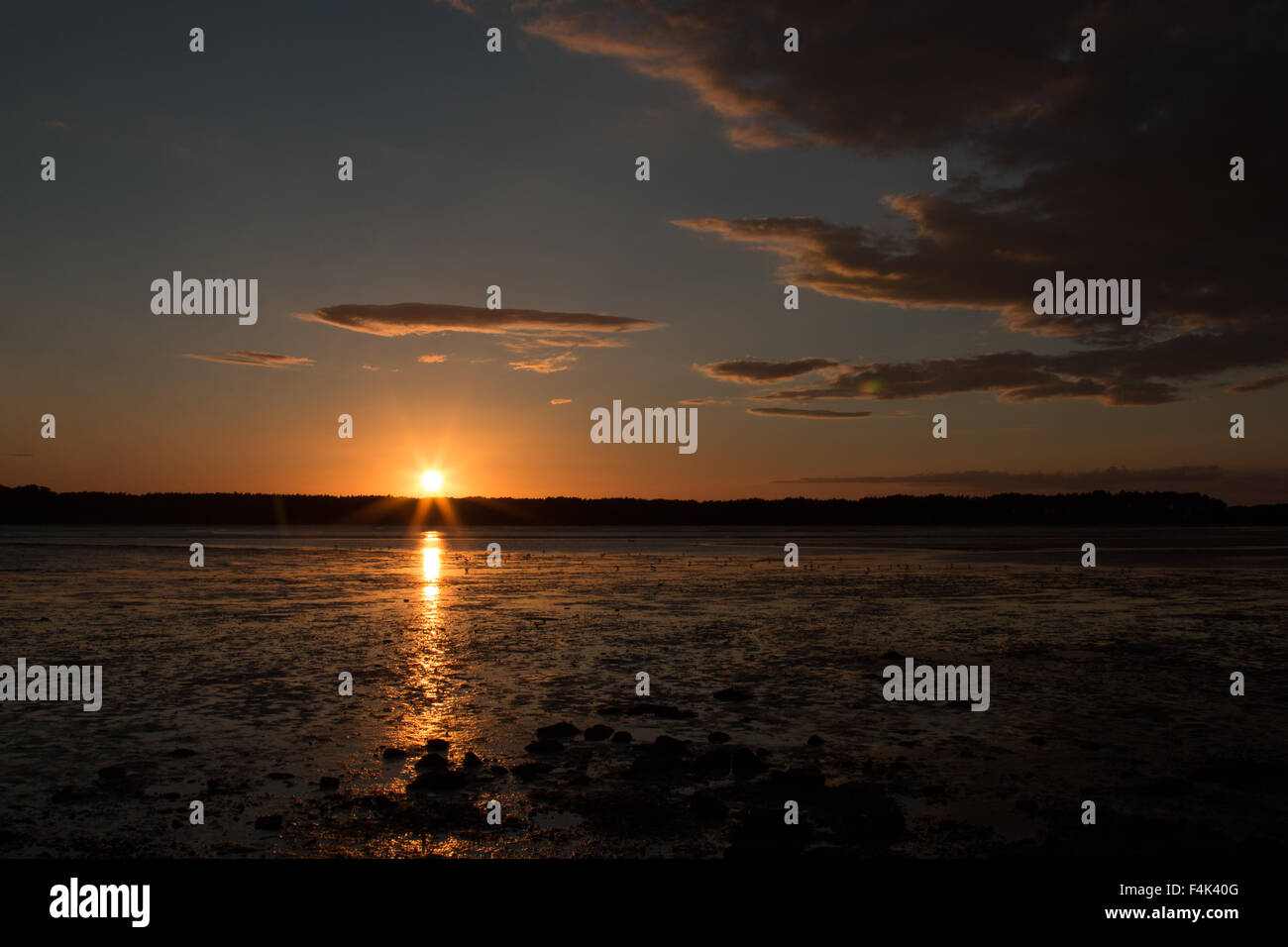 Sunset over a beach hi-res stock photography and images - Alamy