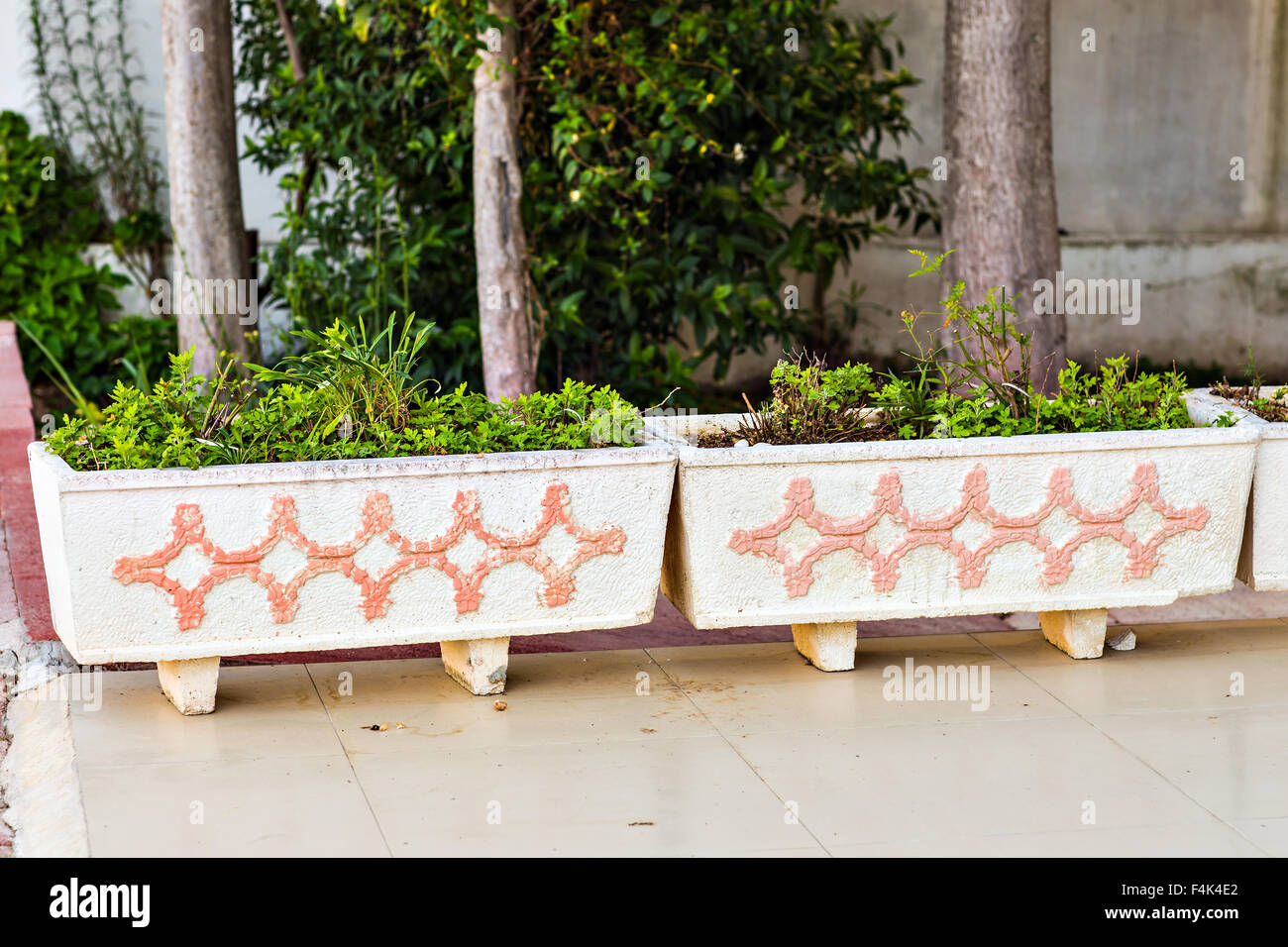 Street planter with flowers Stock Photo - Alamy