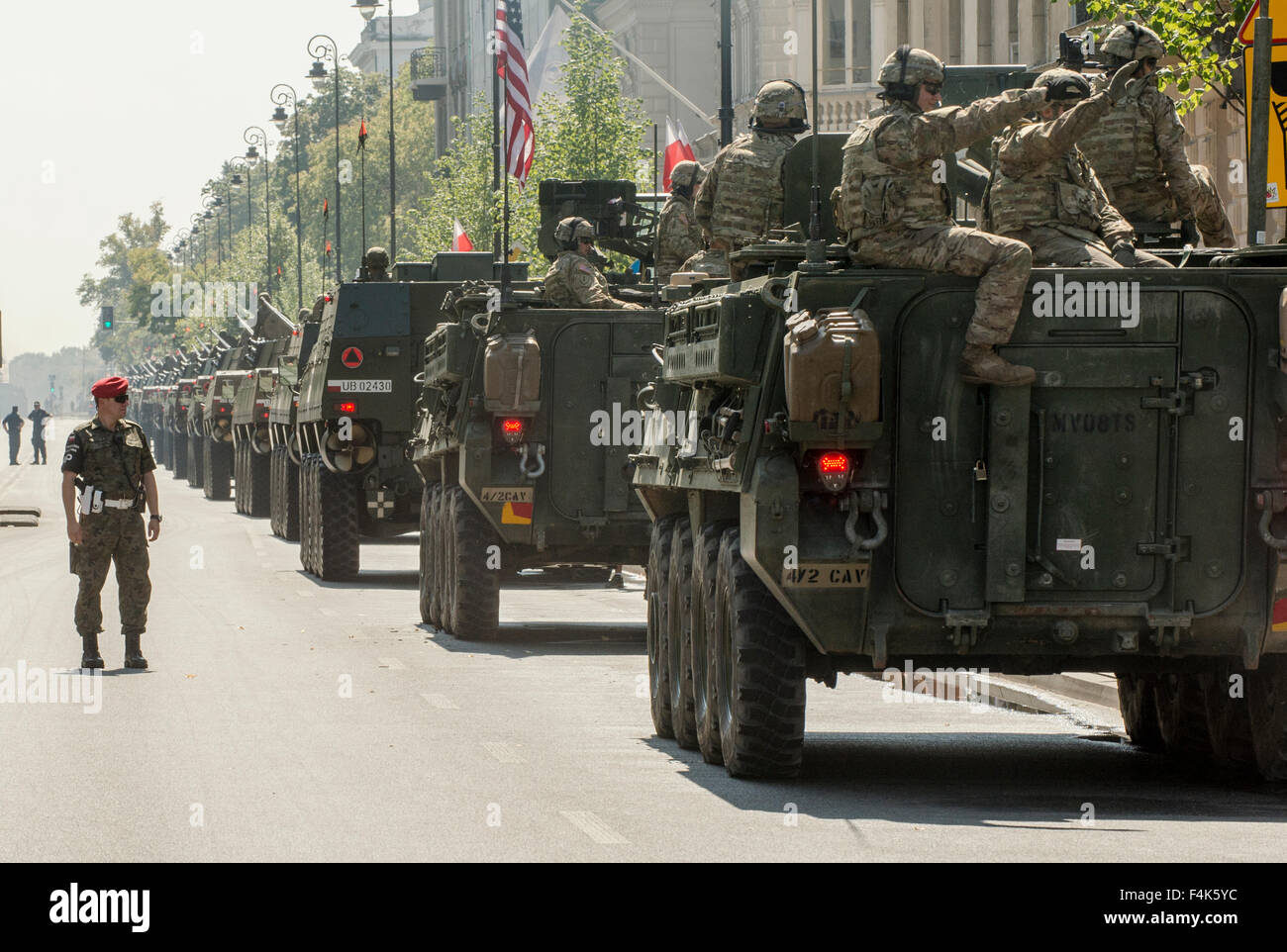 Soldiers, tanks and other military vehicles line up on the streets of ...