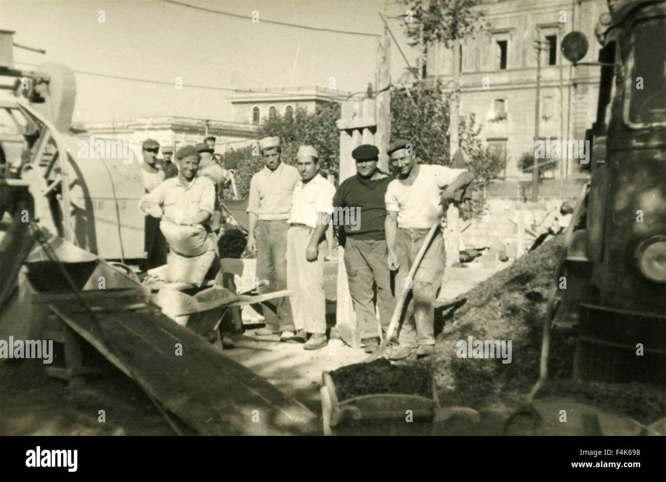 Workers on a construction site in Frascati, Italy Stock Photo - Alamy