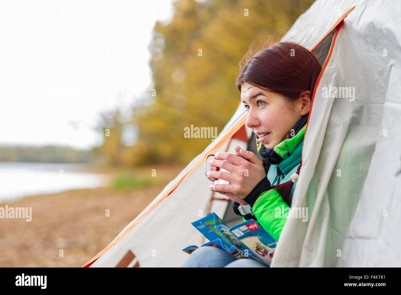 Camping happy woman Stock Photo - Alamy