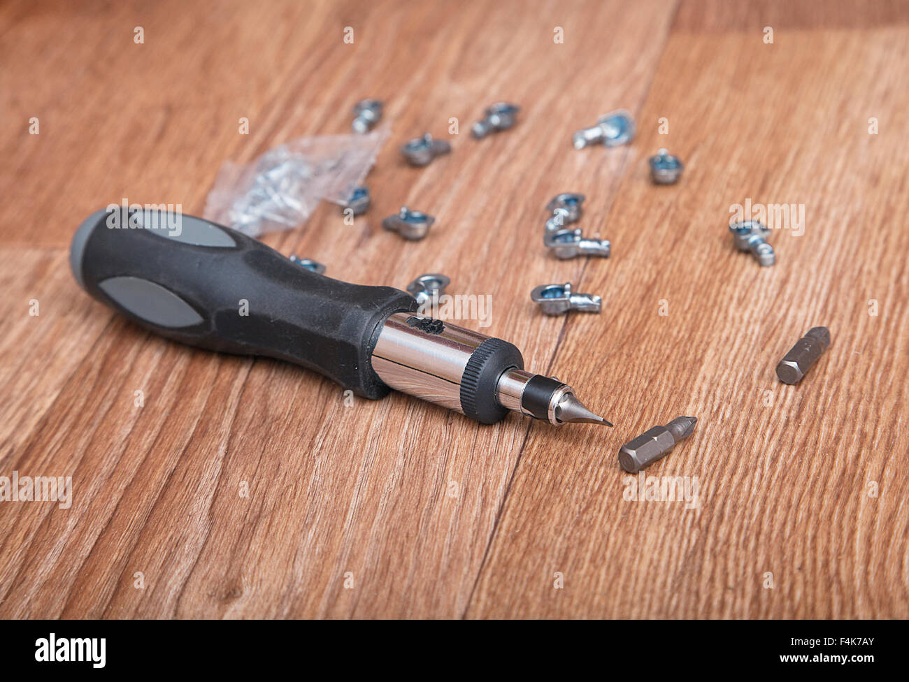 Screwdriver with replacement tips laying on the floor Stock Photo - Alamy