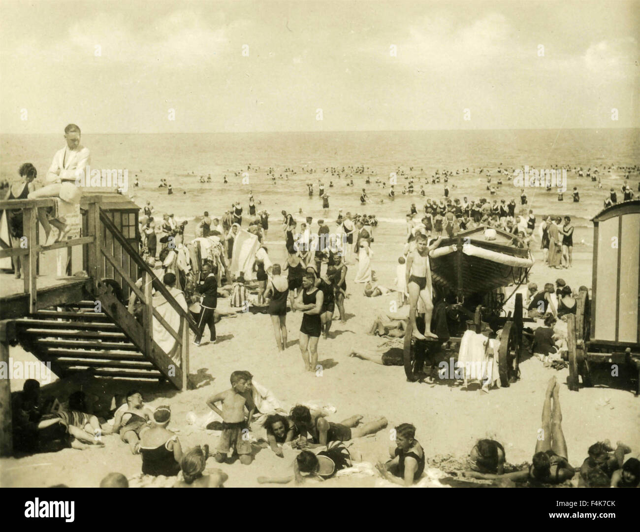 View of bathers on the beach, Italy Stock Photo - Alamy