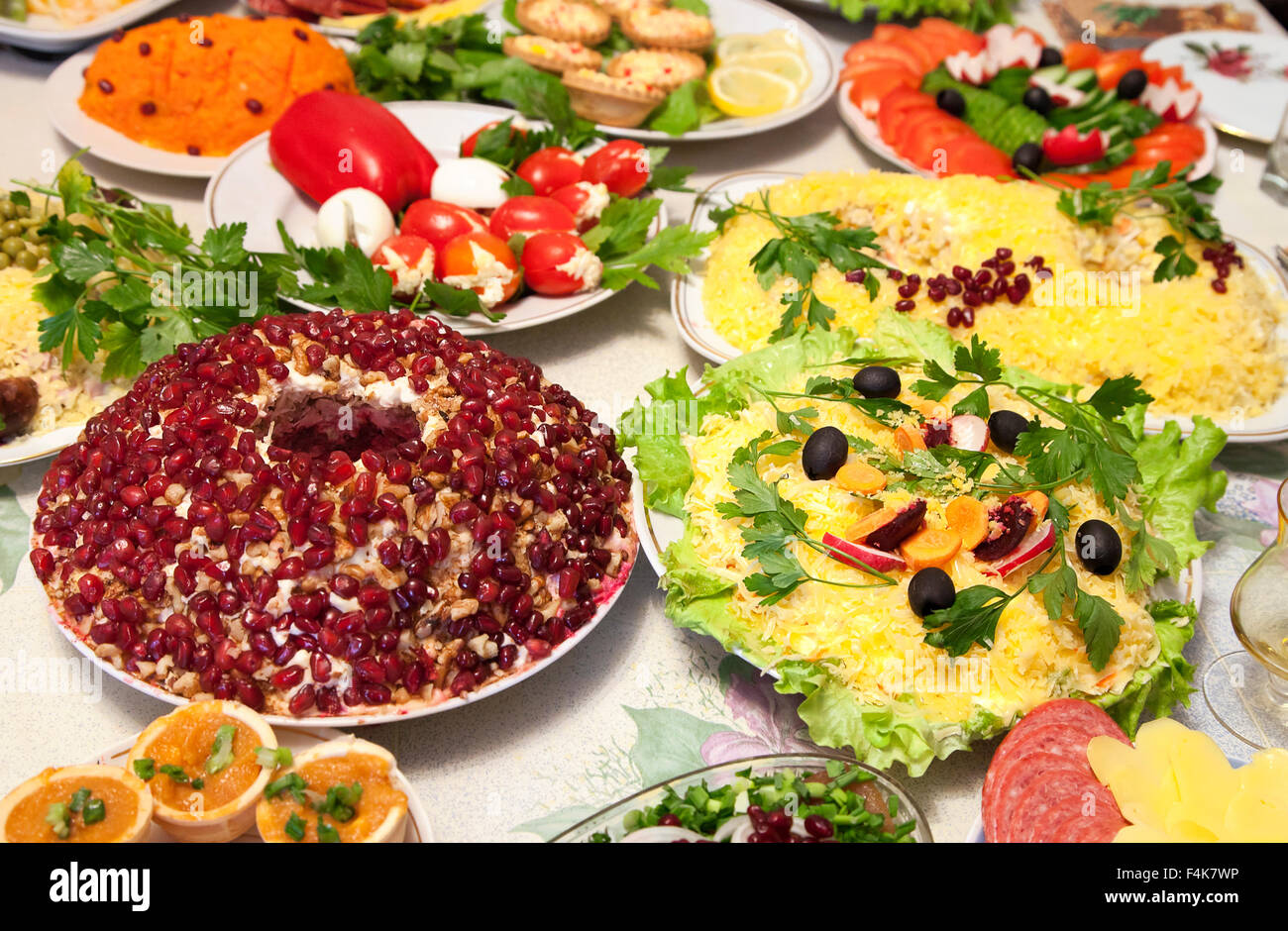 Close-up of festal dinner table with various salads Stock Photo - Alamy