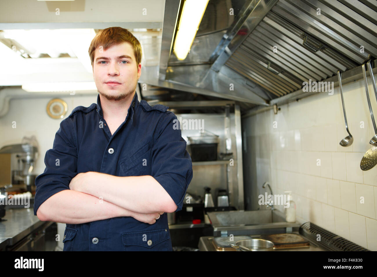 young chef in kitchen Stock Photo - Alamy