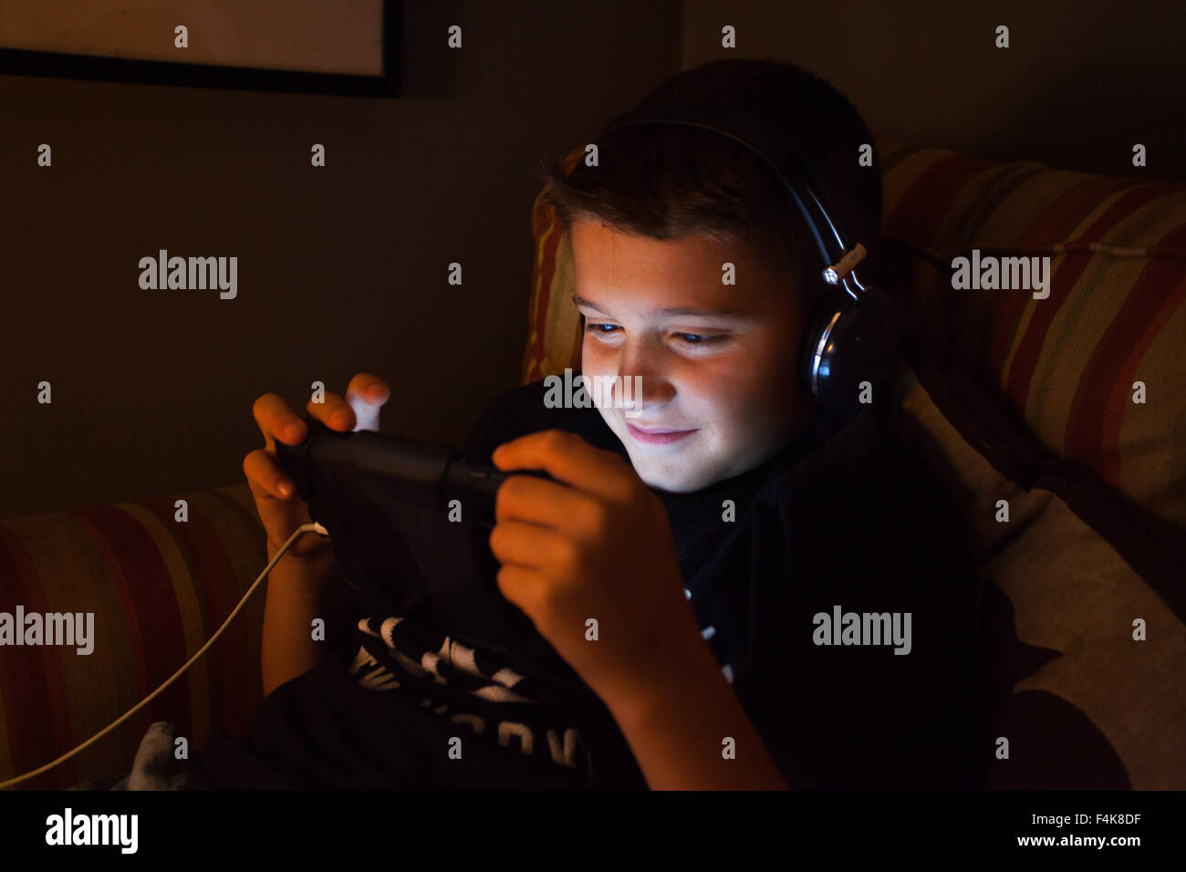 Young boy looking at computer hi-res stock photography and images - Alamy