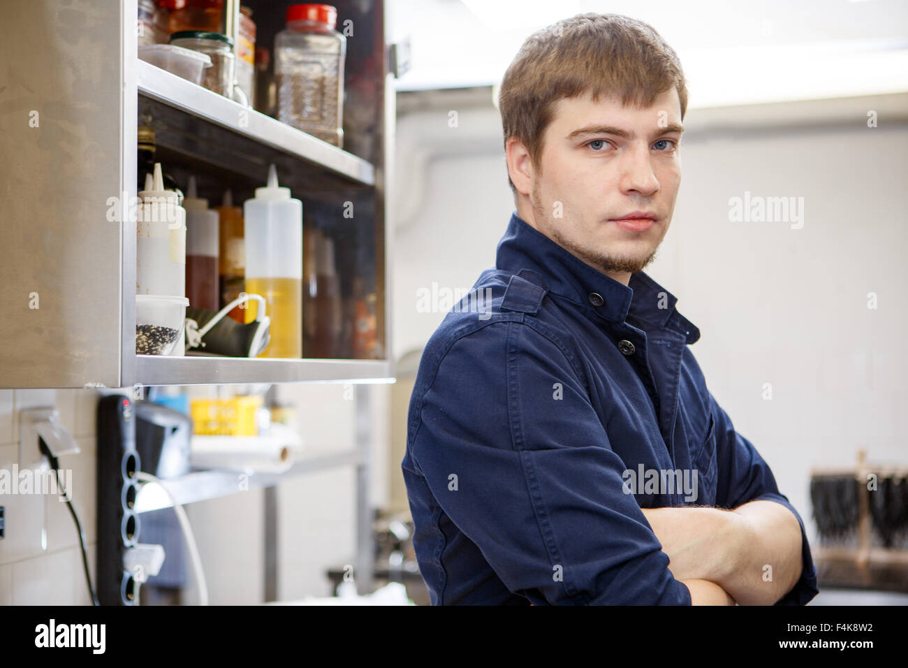 young chef in kitchen Stock Photo - Alamy