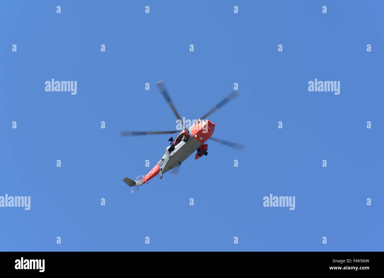 An RAF helicopter flying overhead Stock Photo - Alamy